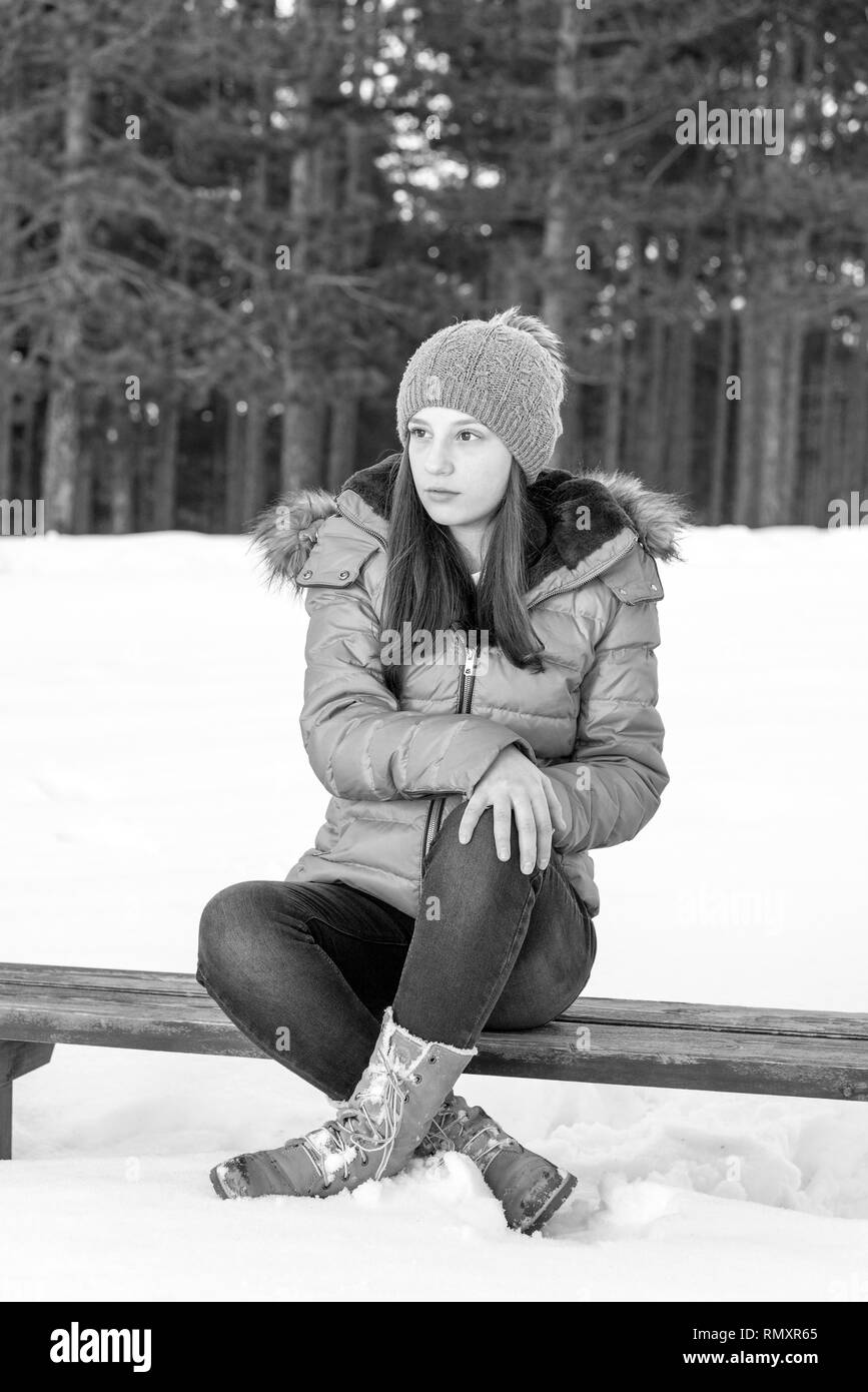 Beautiful girl modeling on snow Stock Photo - Alamy