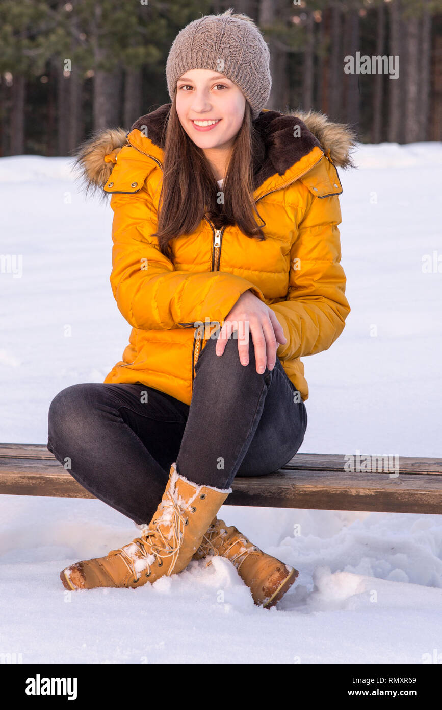 Beautiful girl modeling on snow Stock Photo - Alamy