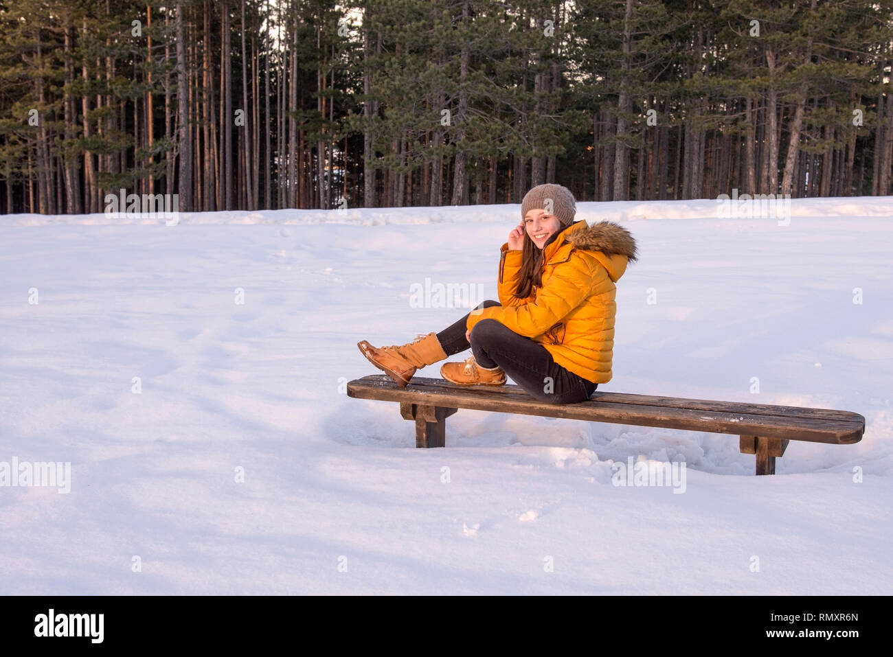 Beautiful girl modeling on snow Stock Photo - Alamy