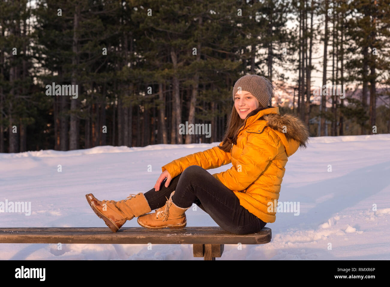 Beautiful girl modeling on snow Stock Photo - Alamy