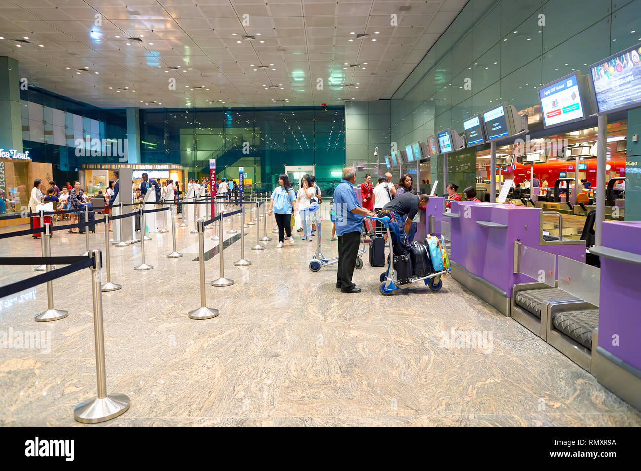 SINGAPORE - CIRCA AUGUST, 2016: check-in counters at Changi Aiport ...