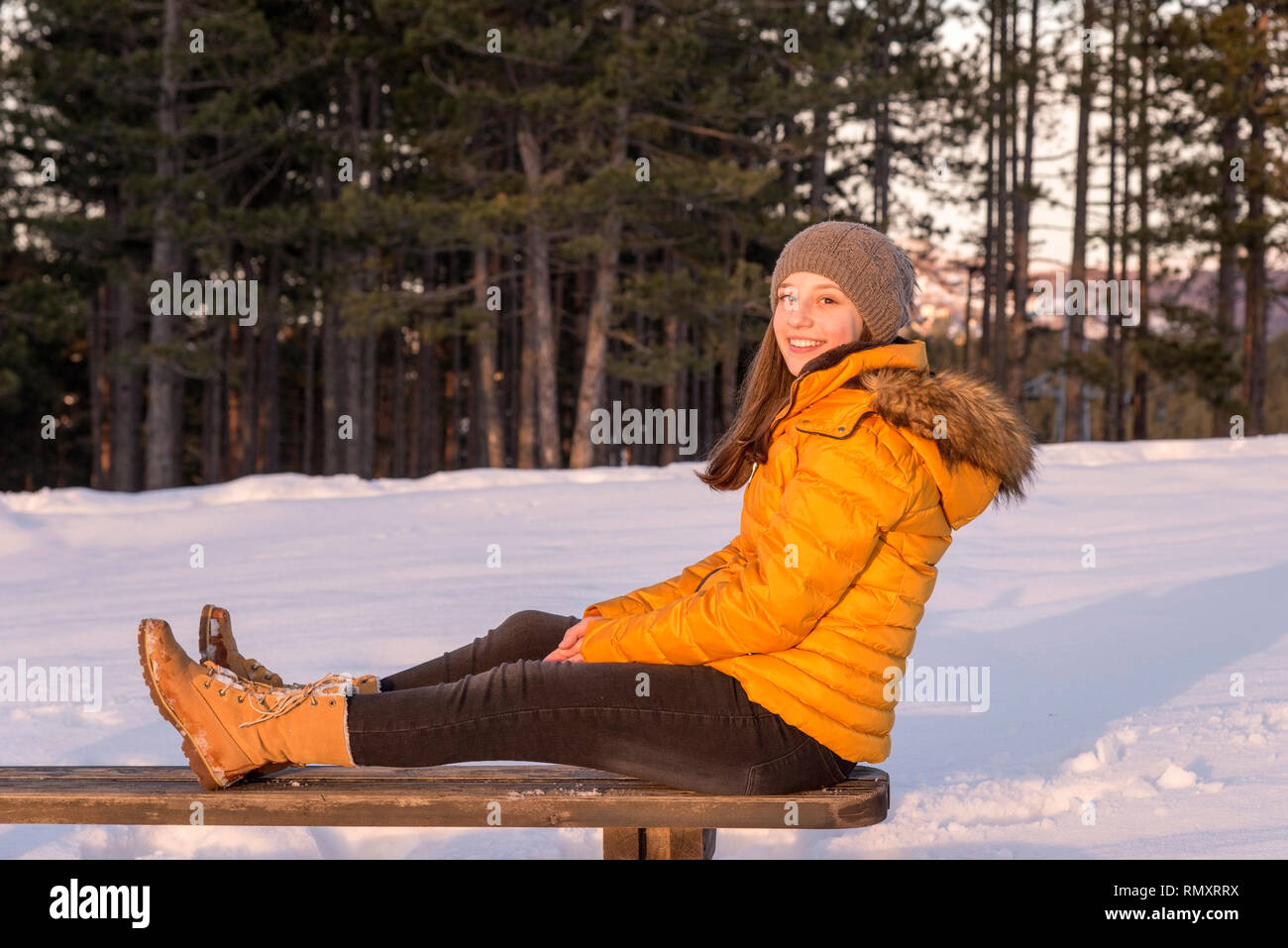 Beautiful girl modeling on snow Stock Photo - Alamy