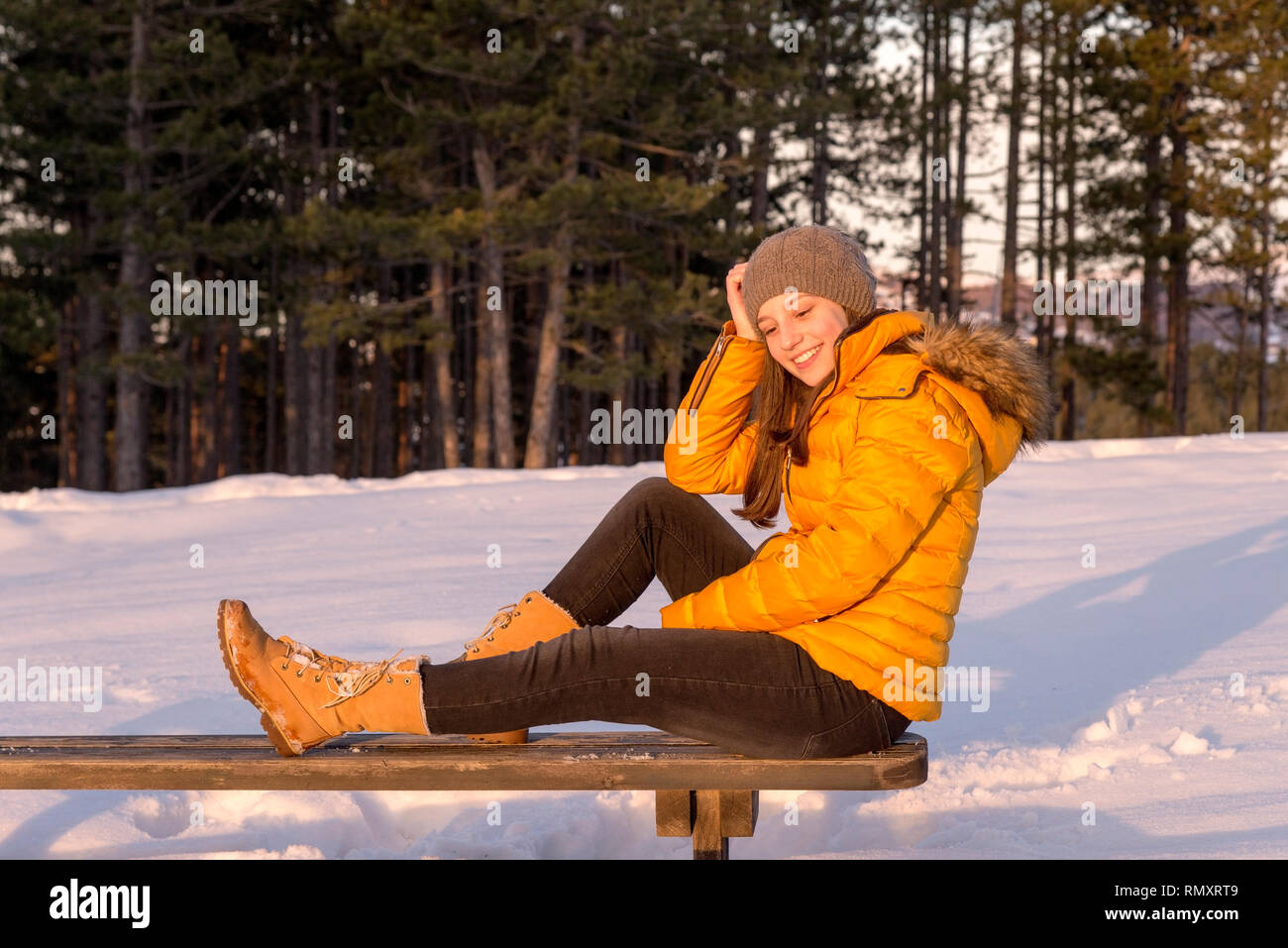 Beautiful girl modeling on snow Stock Photo - Alamy