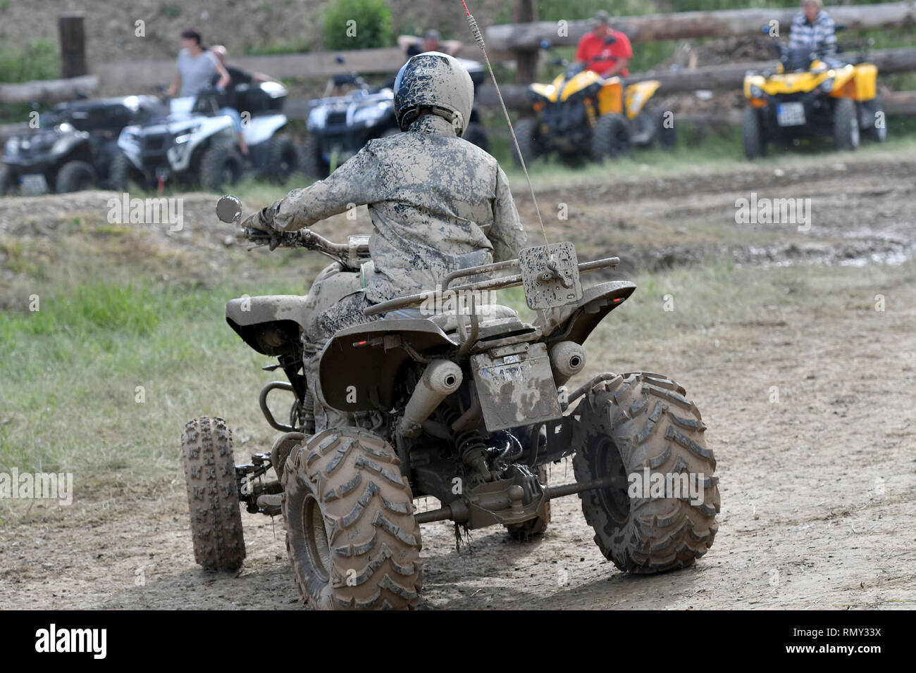 A man riding a quad/ATV offroad Stock Photo - Alamy