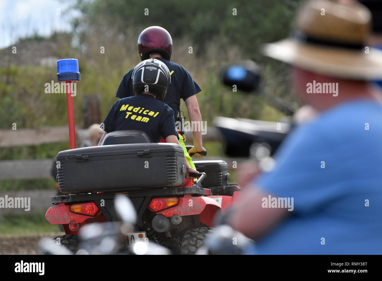 Medical team riding a quad/ATV offroad Stock Photo - Alamy