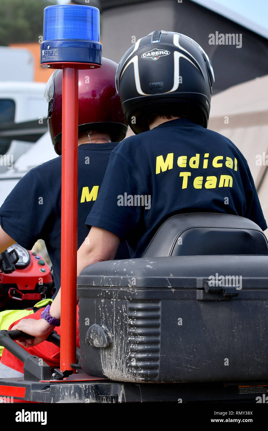 Medical team riding a quad/ATV offroad Stock Photo - Alamy