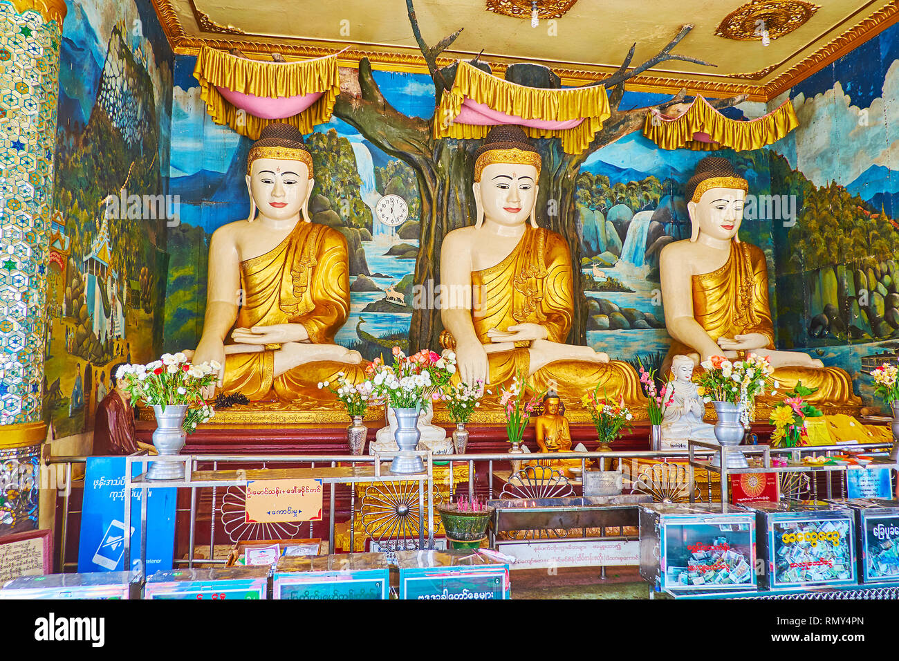 BAGO, MYANMAR - FEBRUARY 15, 2018: The scenic altar of the Image house ...