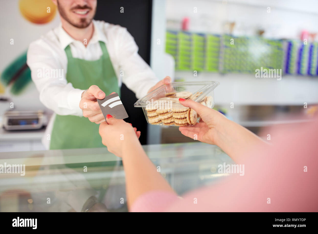 Customer buying cookies hi-res stock photography and images - Alamy