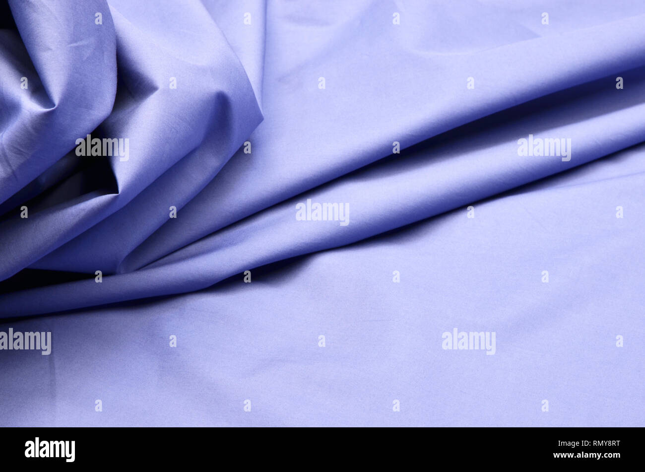 Cotton fabrics of light blue color Stock Photo - Alamy