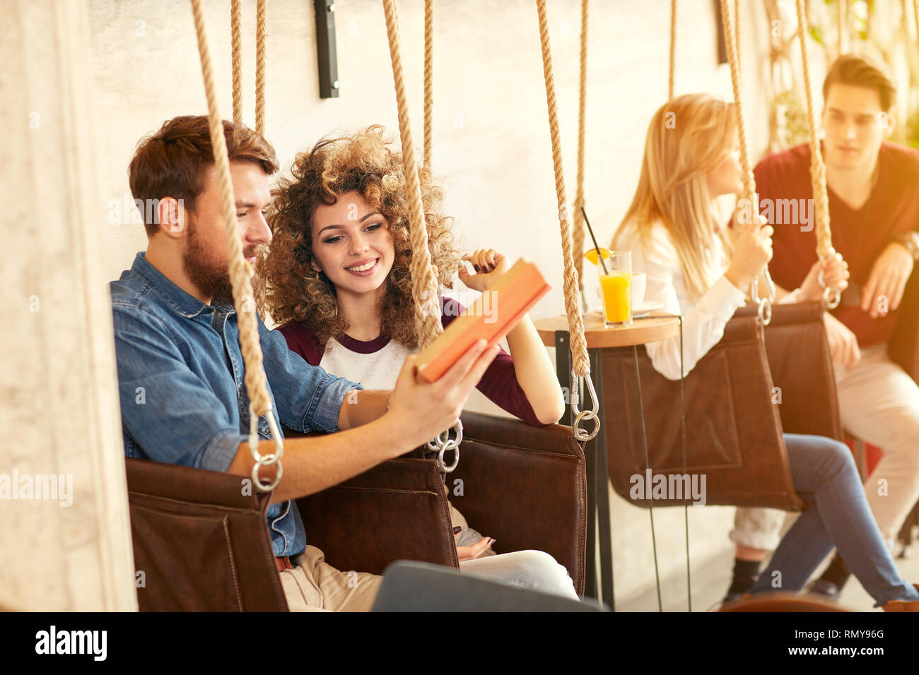 Book on swing hi-res stock photography and images - Alamy