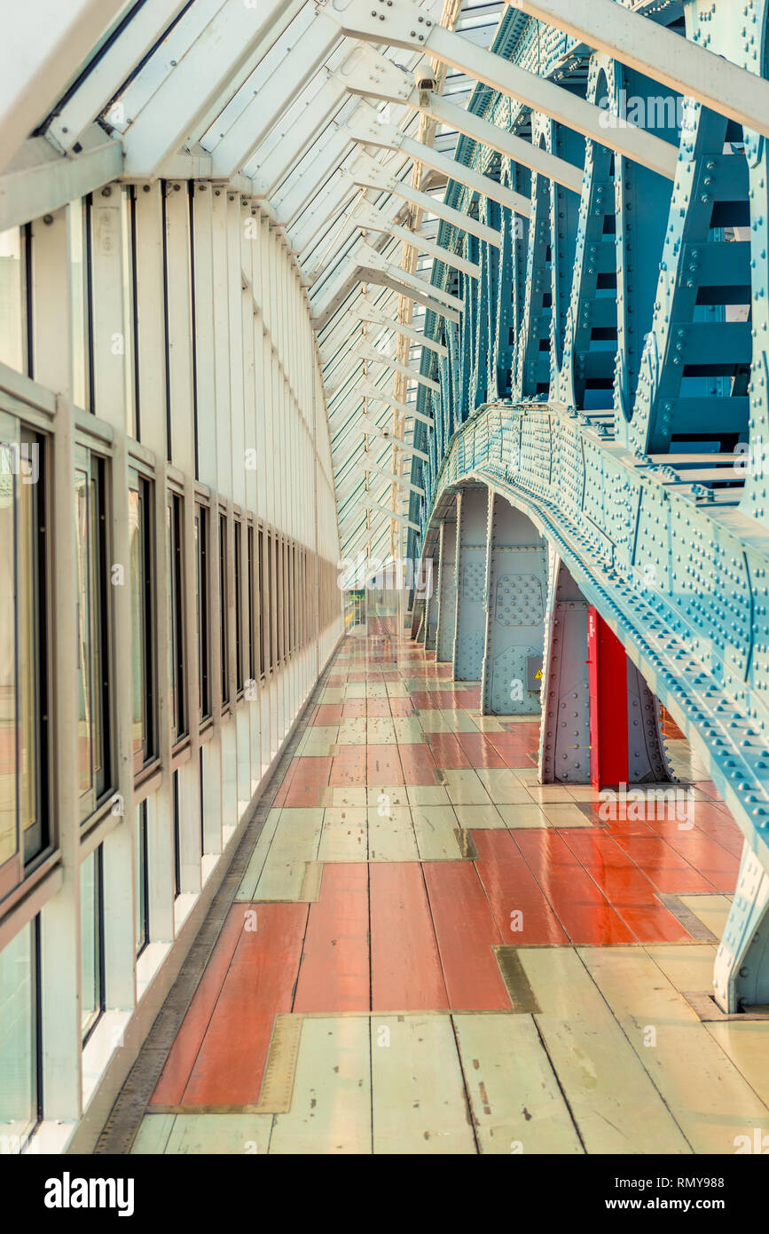 Details of the pedestrian bridge inside the city buildings Stock Photo ...