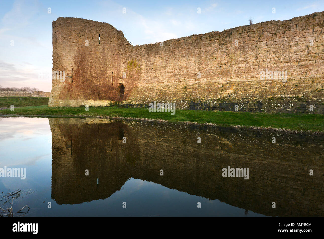 Pevensey Castle, East Sussex, UK. The ruins of a medieval castle stand ...