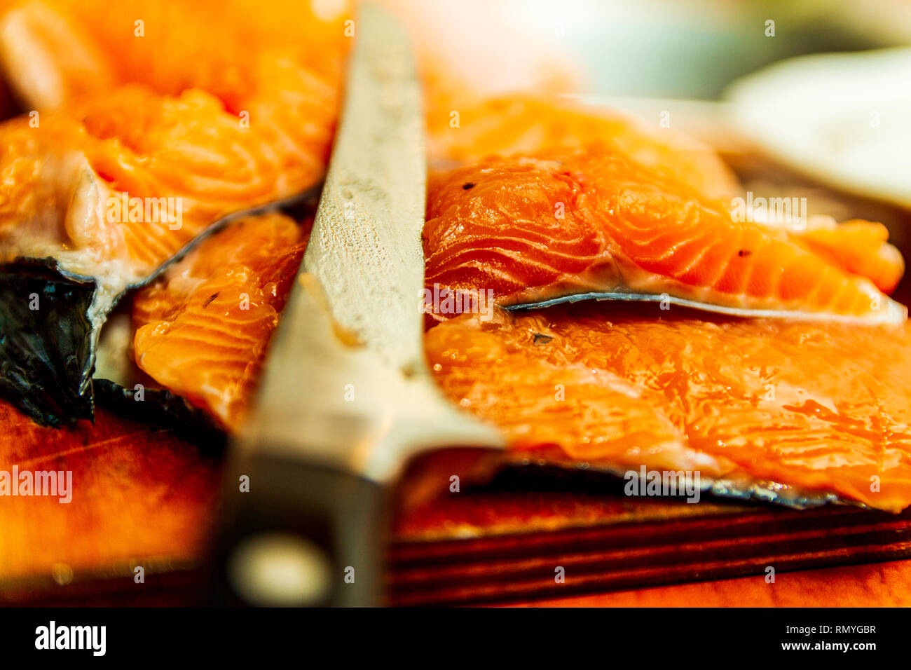 Cutting fish pieces hi-res stock photography and images - Alamy
