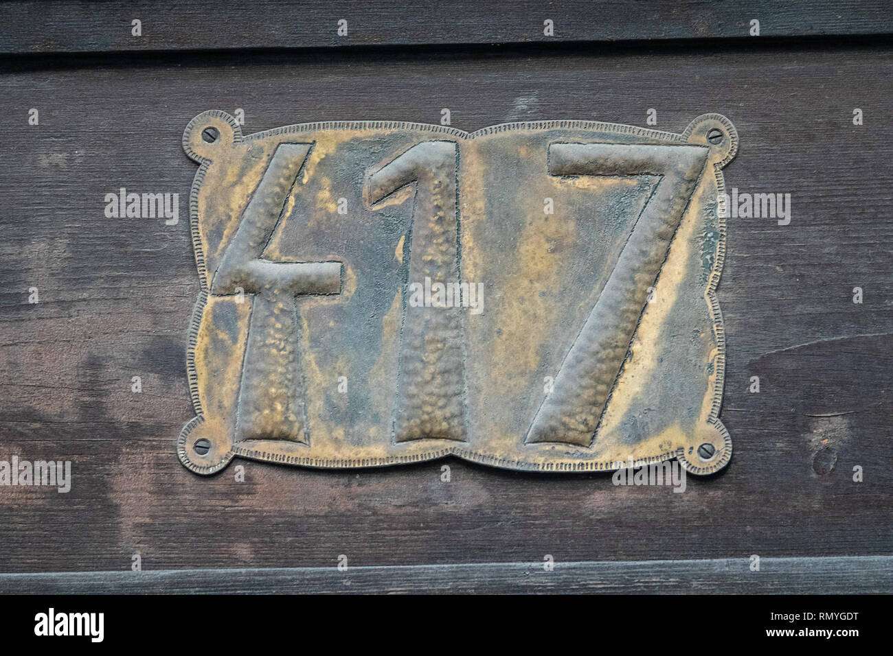 old house number made of sheet metal 417 Stock Photo - Alamy