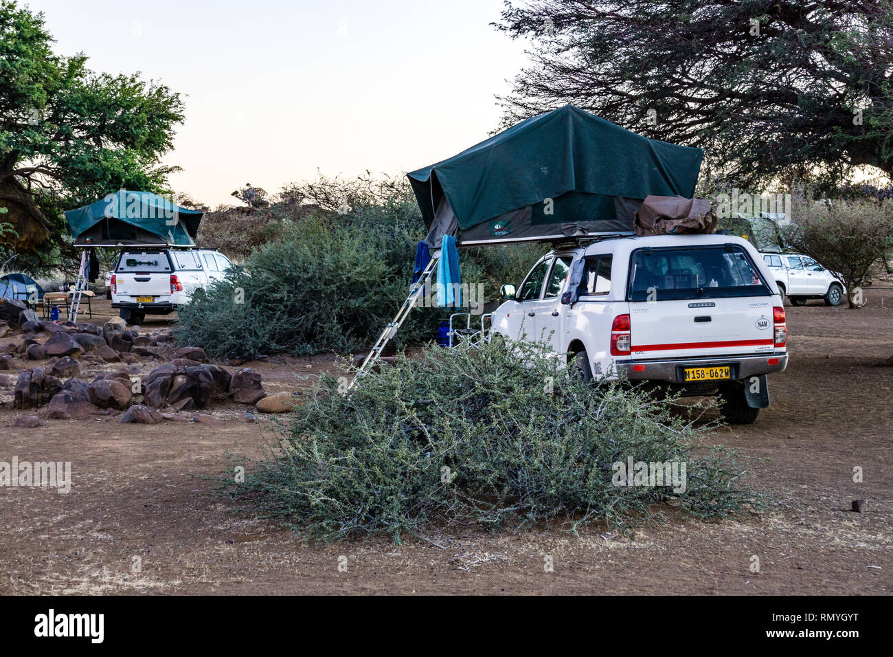 Offroad 4x4 vehicle with tent in the roof ready for camping in the ...