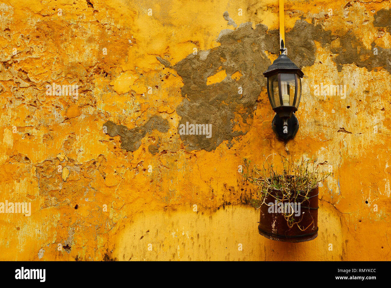 A yellow wall on an old historic building in the UNESCO listed central ...