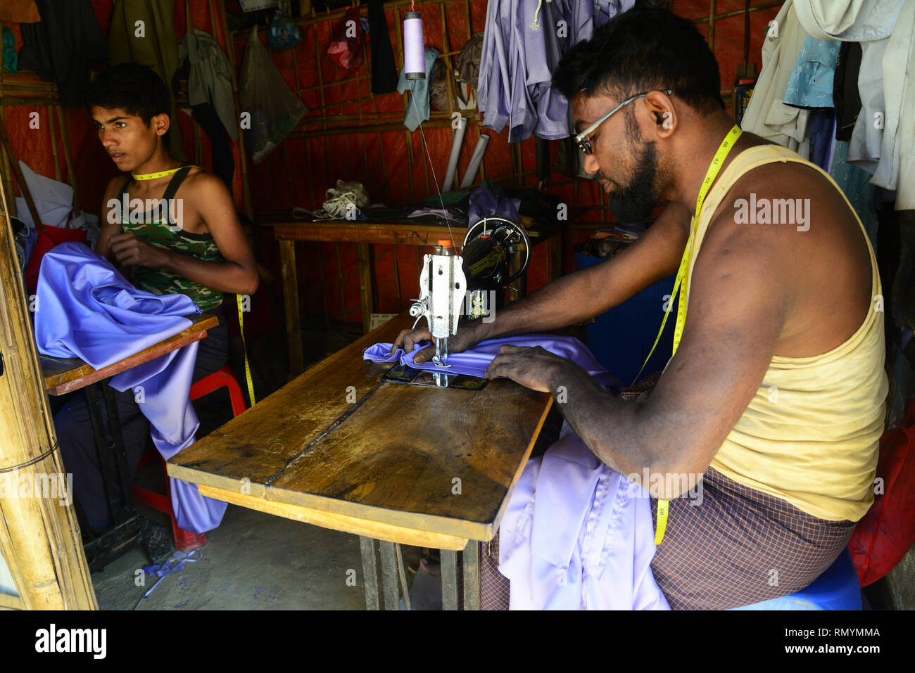 Indian poor shopkeeper tailor hi-res stock photography and images - Alamy