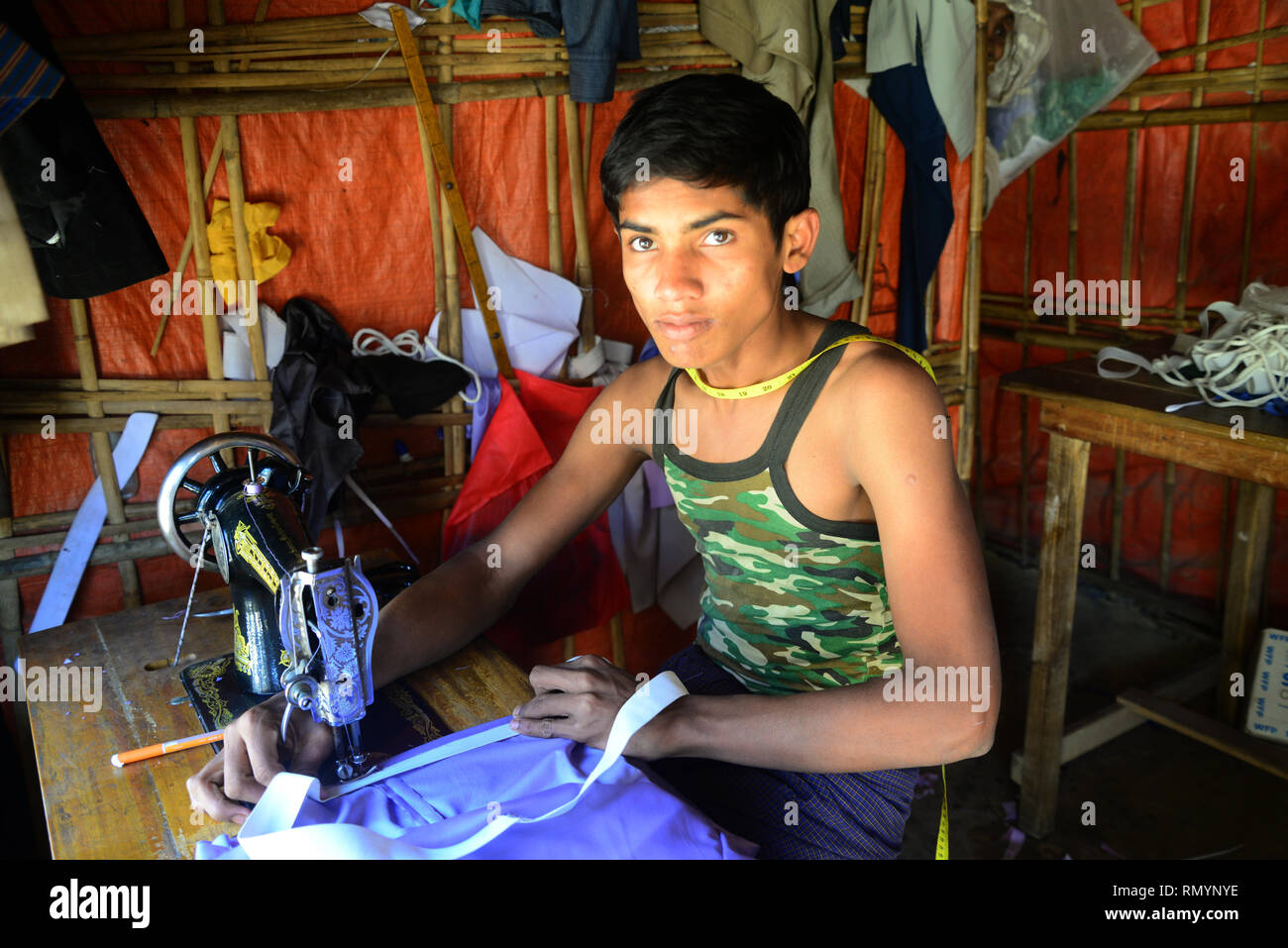 Indian poor shopkeeper tailor hi-res stock photography and images - Alamy
