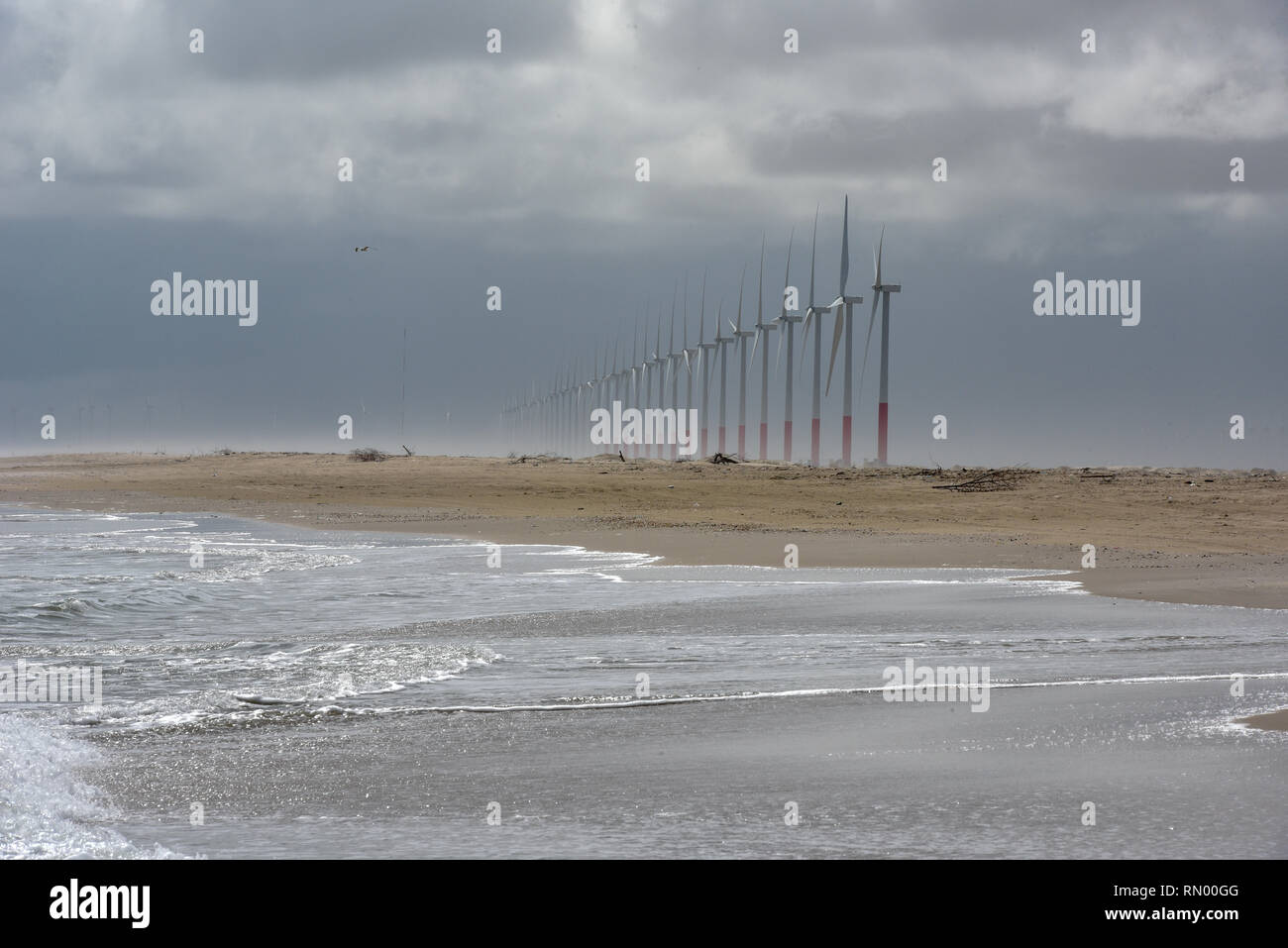 Environment energy wind power windmills beach hi-res stock photography ...