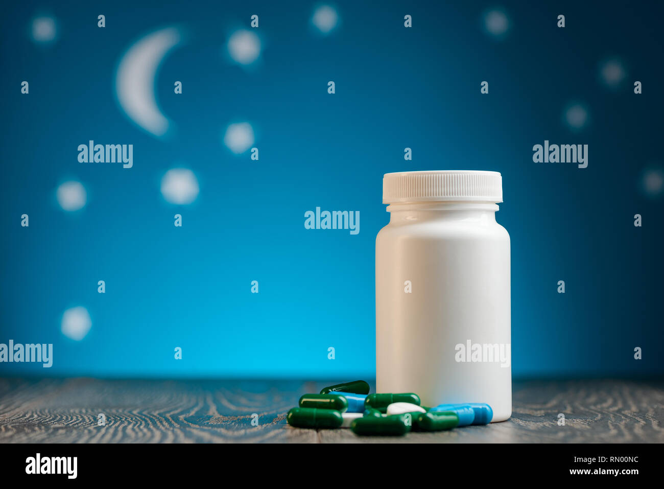 Pill bottle and blue hi-res stock photography and images - Alamy