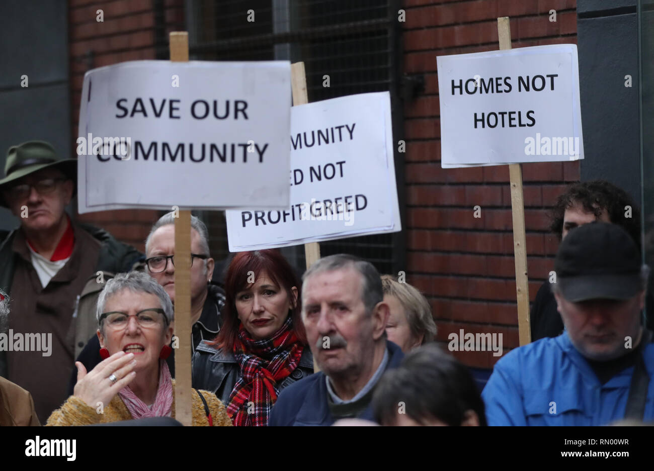 Local residents demonstrate at the site of a proposed new high rise ...
