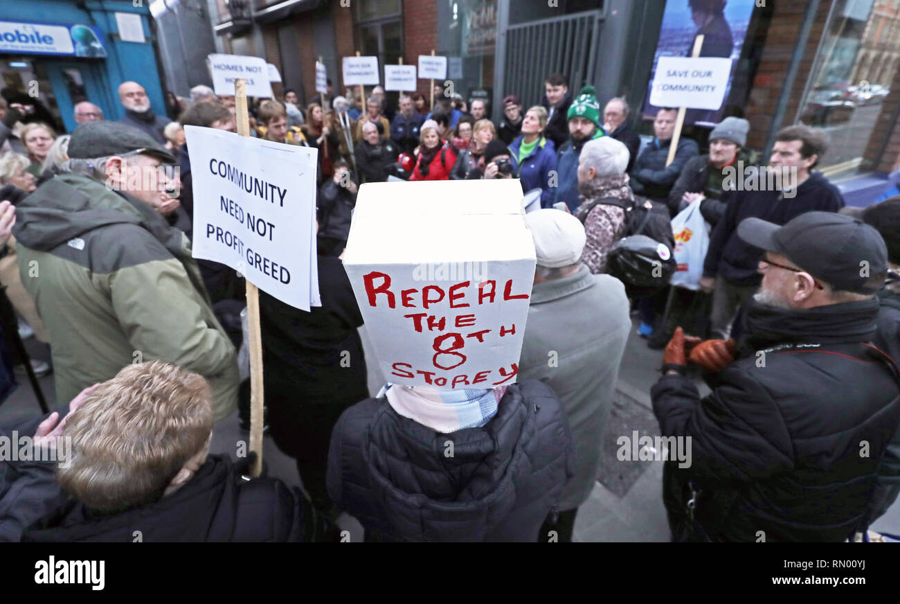 Local residents demonstrate at the site of a proposed new high rise ...