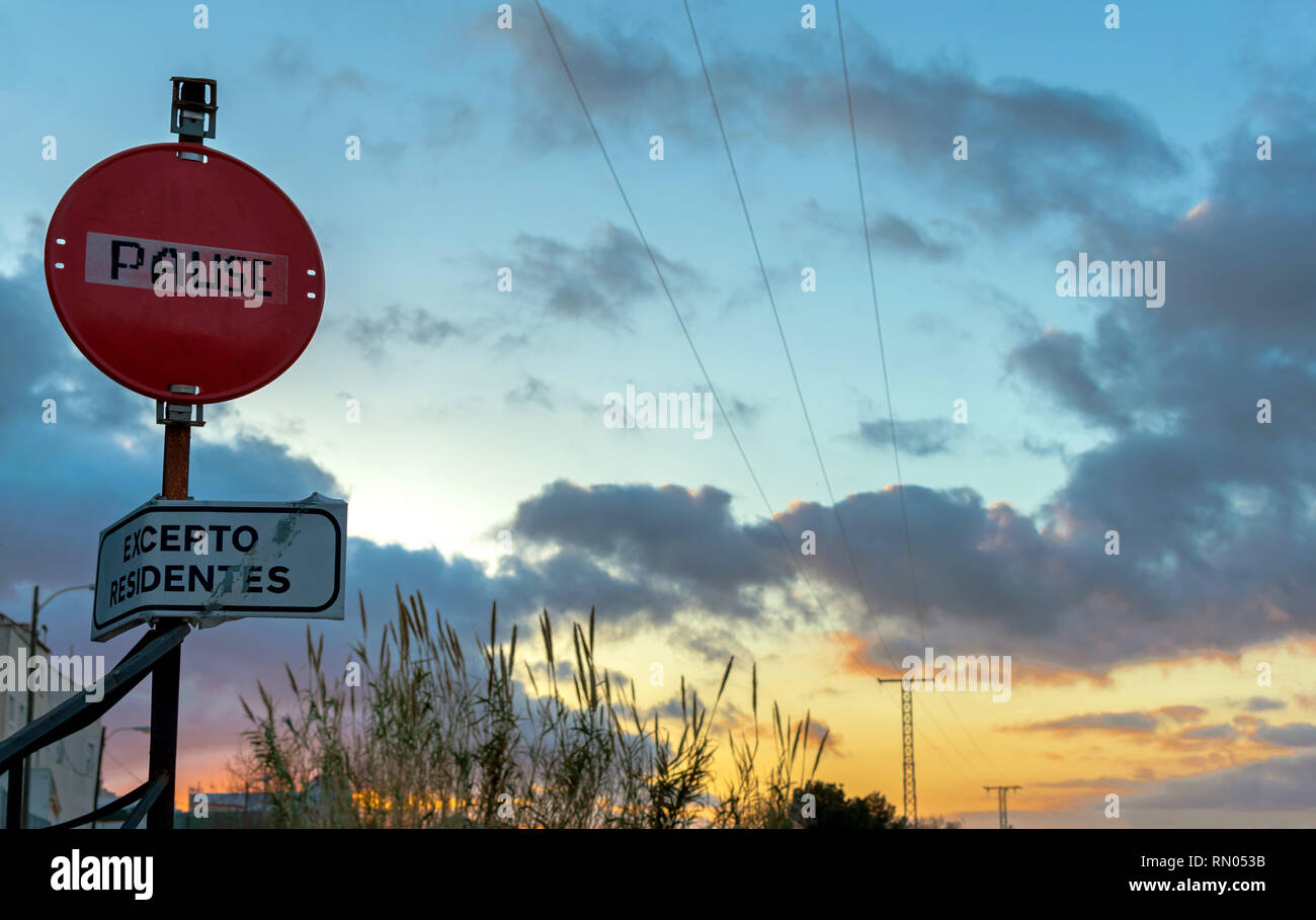stop sign against clouds at sunset Stock Photo - Alamy
