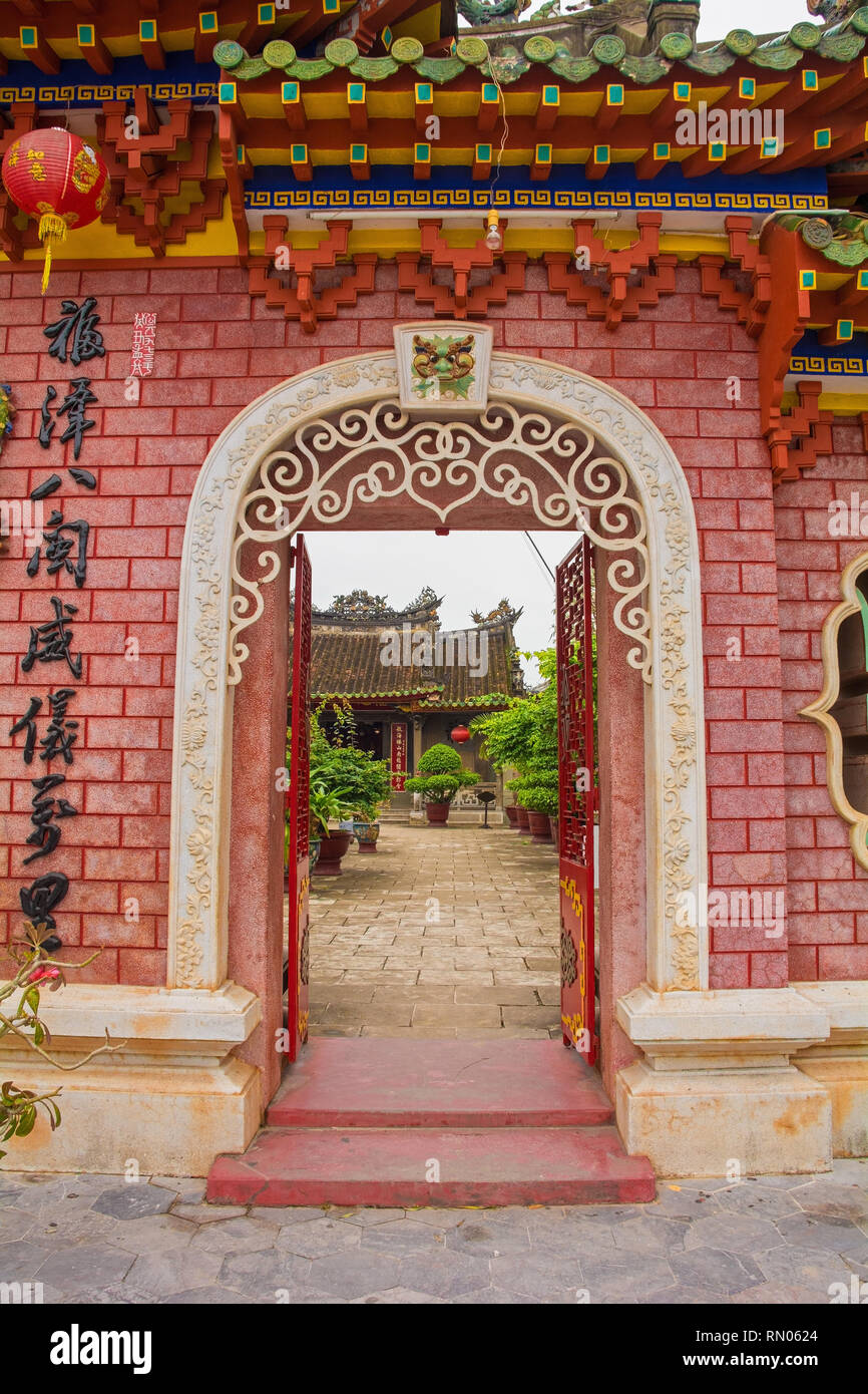 A view through the three entrance gate towards the Phuoc Kien (or ...