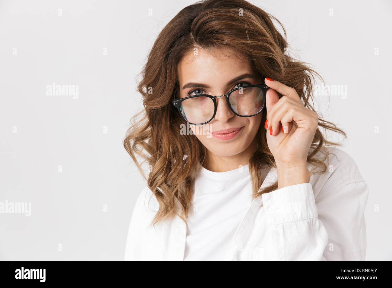 Portrait Of Gorgeous Woman Wearing Eyeglasses Smiling While Standing