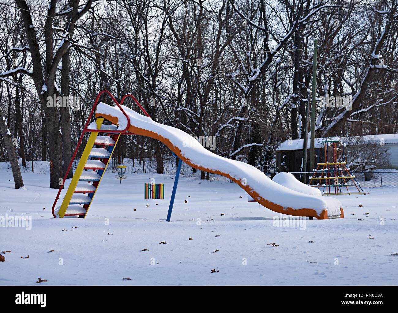 snow covered playground equipment Stock Photo - Alamy