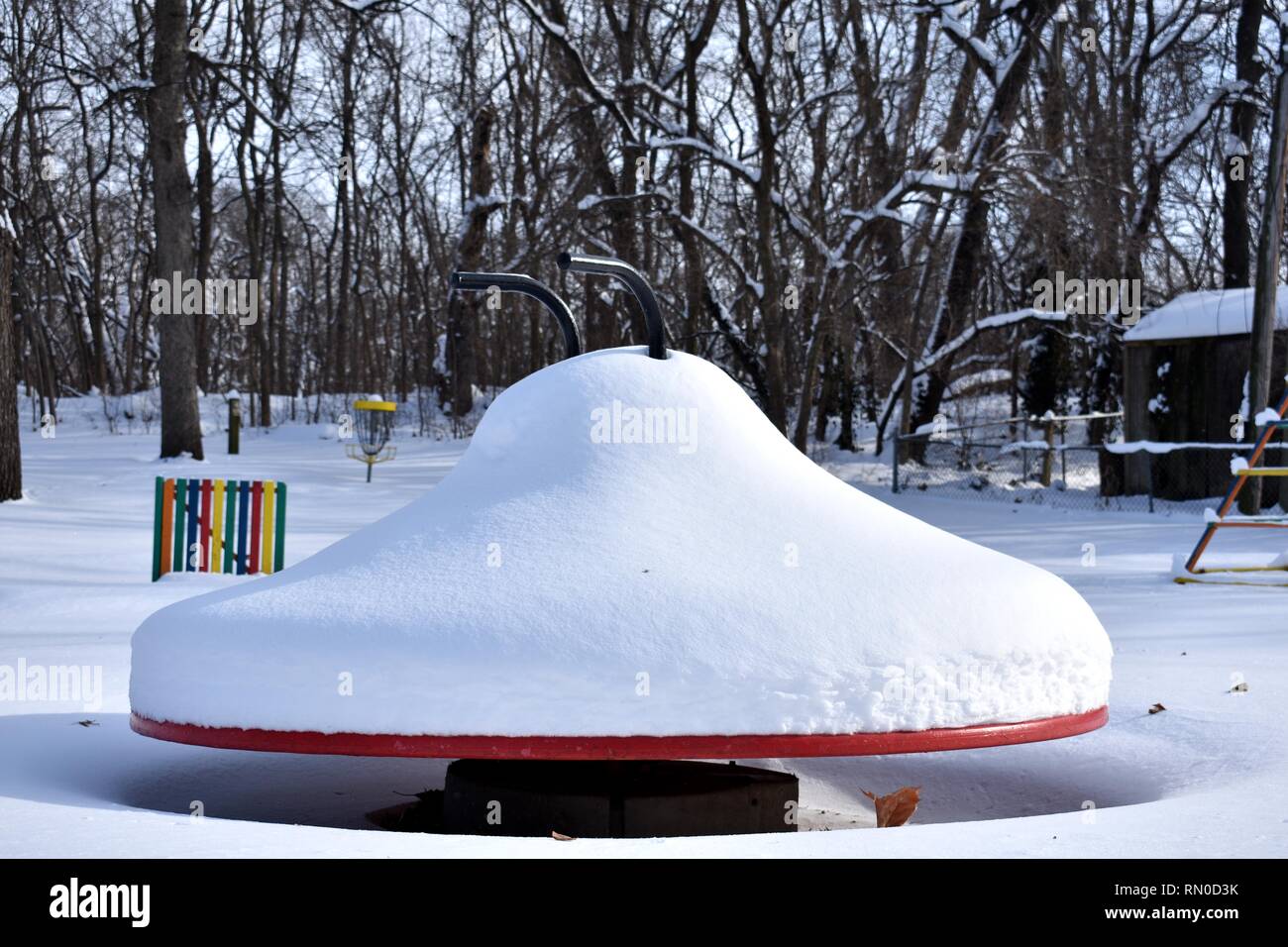 snow covered playground equipment Stock Photo - Alamy