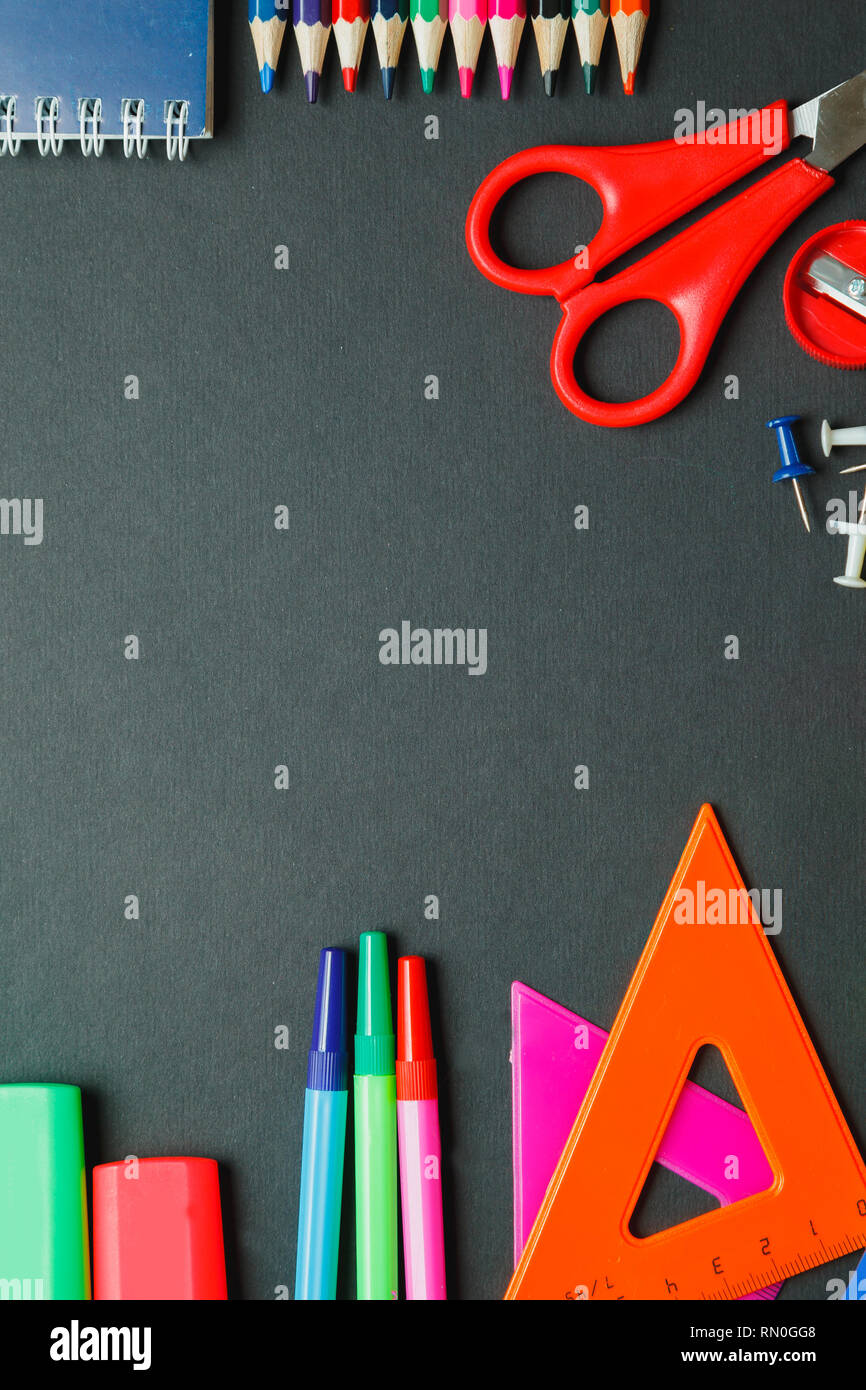 Back to school concept on dark background Stock Photo - Alamy