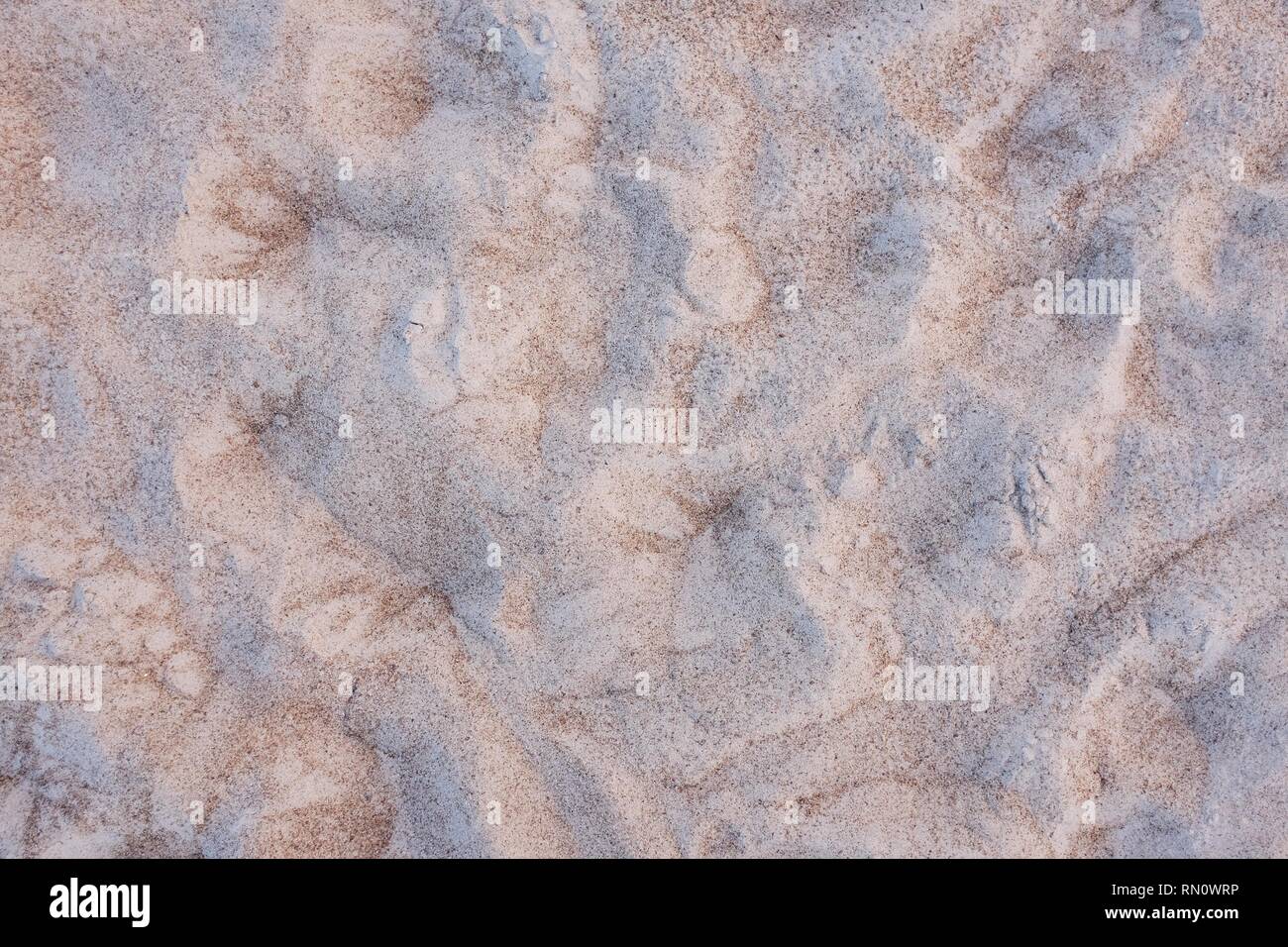 Sunset on the beach. Sand texture Stock Photo - Alamy