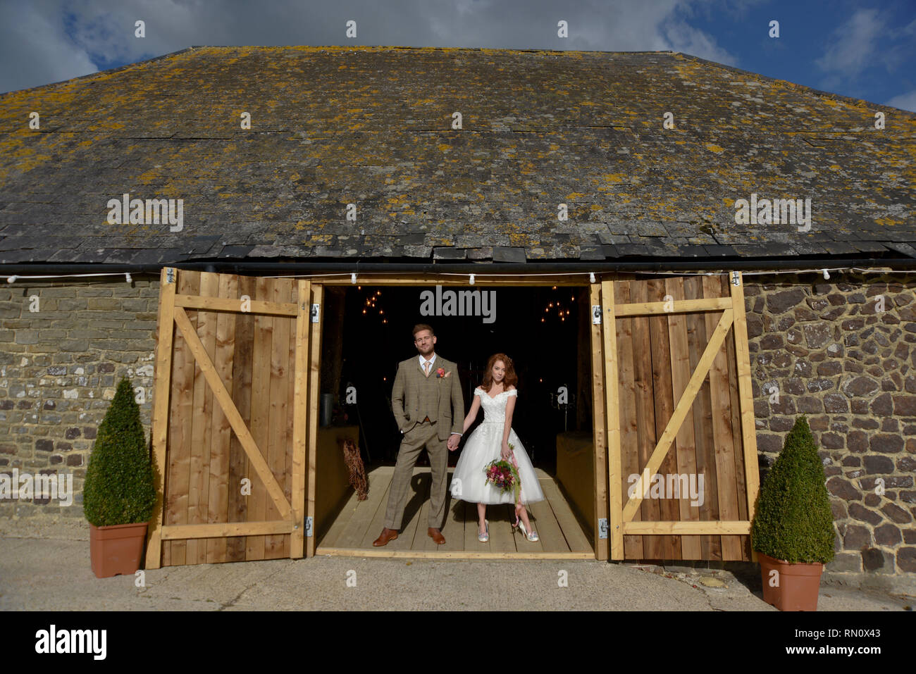 A beautiful couple get married in a romantic Farm location- she is a ...