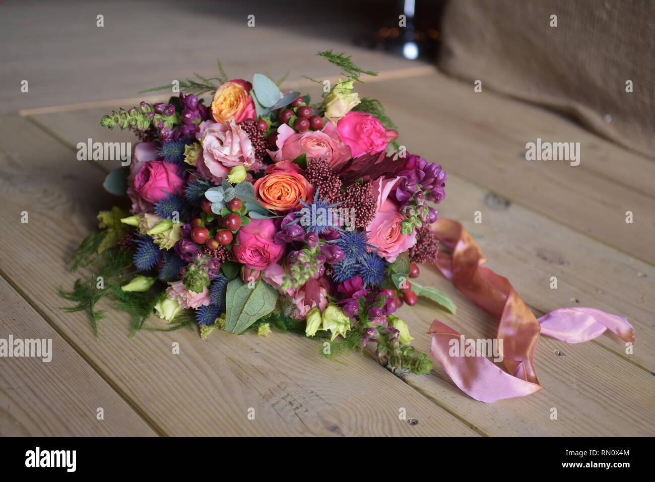 Beautiful vibrant cut flowers in a display in a strong low natural ...