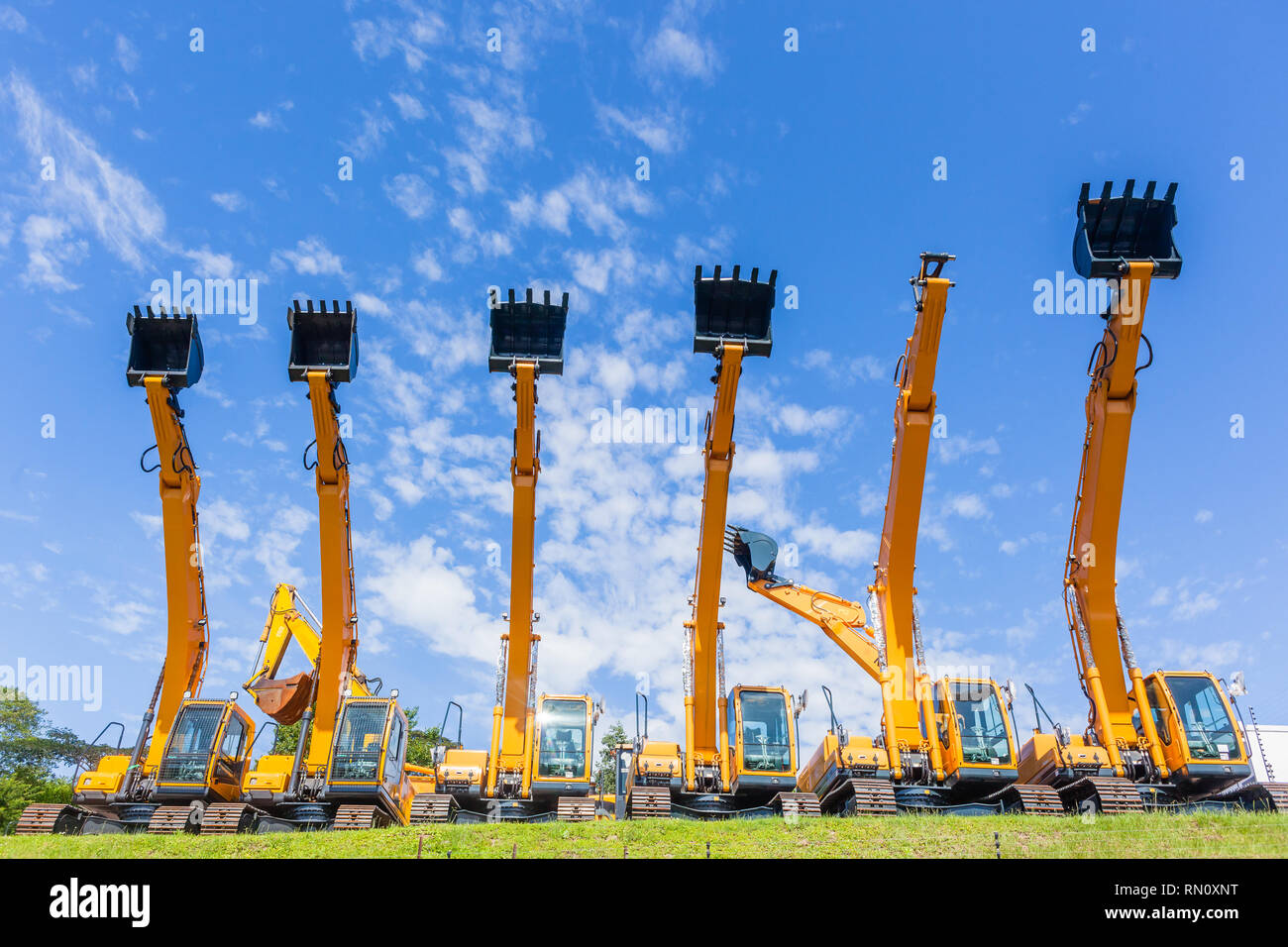 Construction business industry new excavators machines together ...