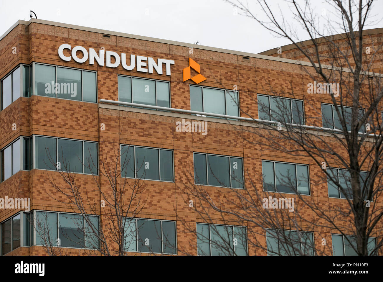 A logo sign outside of a facility occupied by Conduent in Germantown ...