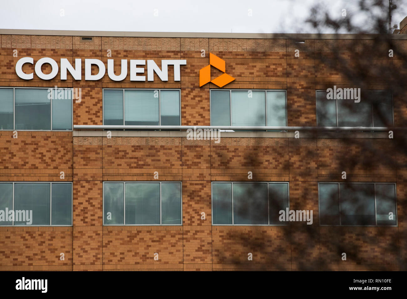 A logo sign outside of a facility occupied by Conduent in Germantown ...
