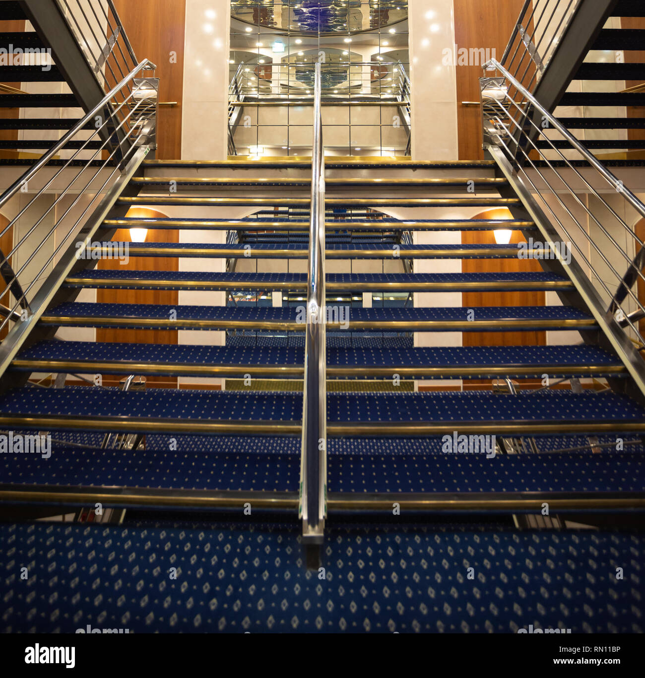 A particular view of a luxurious staircase in a cruise ship. Square ...