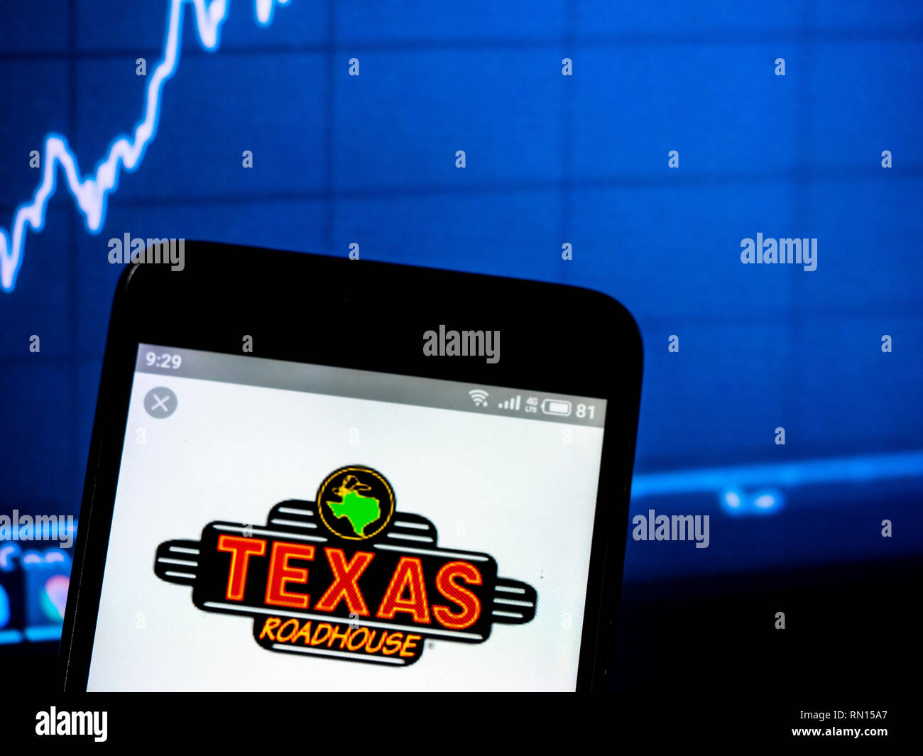 Texas Roadhouse American chain restaurant logo seen displayed on smart ...