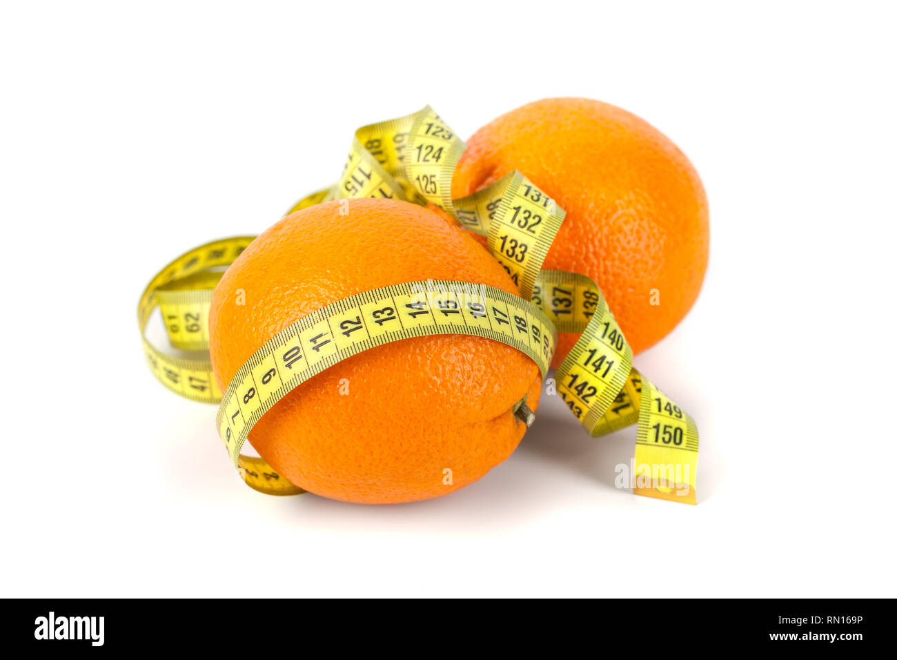 Orange Fruit with measurement isolated on white. Concept of dieting and ...
