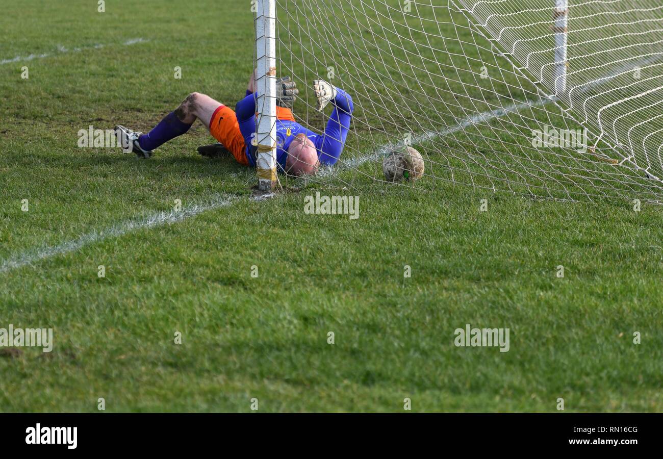 The Hathersage goalie is beaten by a free-kick to give Fairfield FC a 1 ...