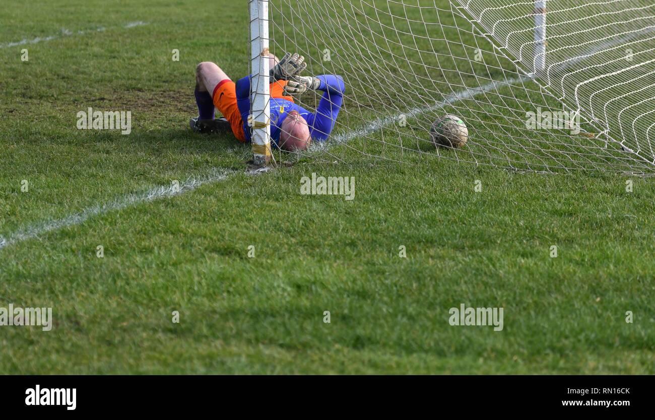 The Hathersage goalie is beaten by a free-kick to give Fairfield FC a 1 ...