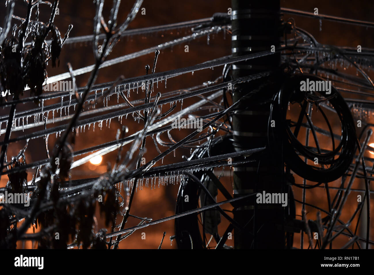 Electricity cables covered in ice after frozen rain phenomenon Stock ...
