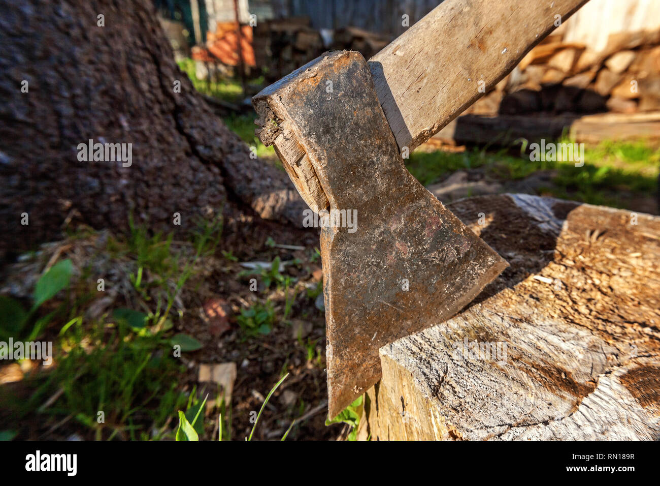Travel, adventure, camping gear, outdoors items. Axe in stump. Axe ...
