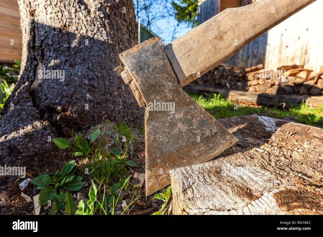 Travel, adventure, camping gear, outdoors items. Axe in stump. Axe ...