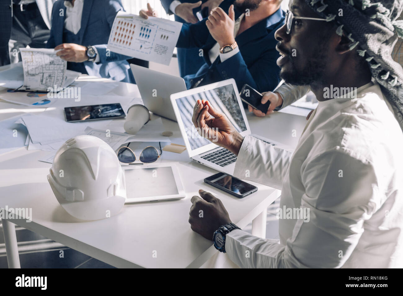 Close up top view of confident business men of different race and ages ...