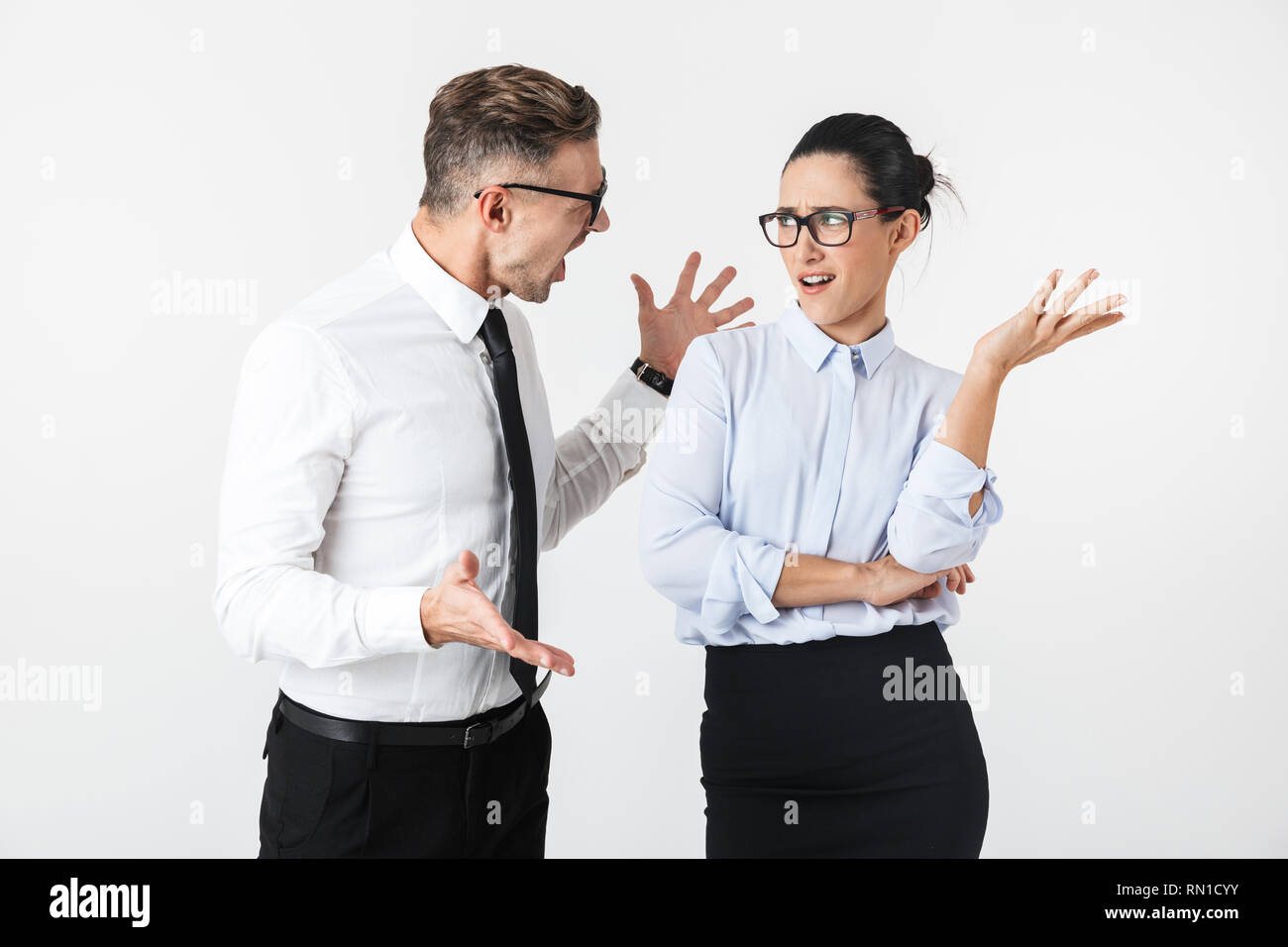 Photo of displeased angry quarrel business colleagues couple isolated ...