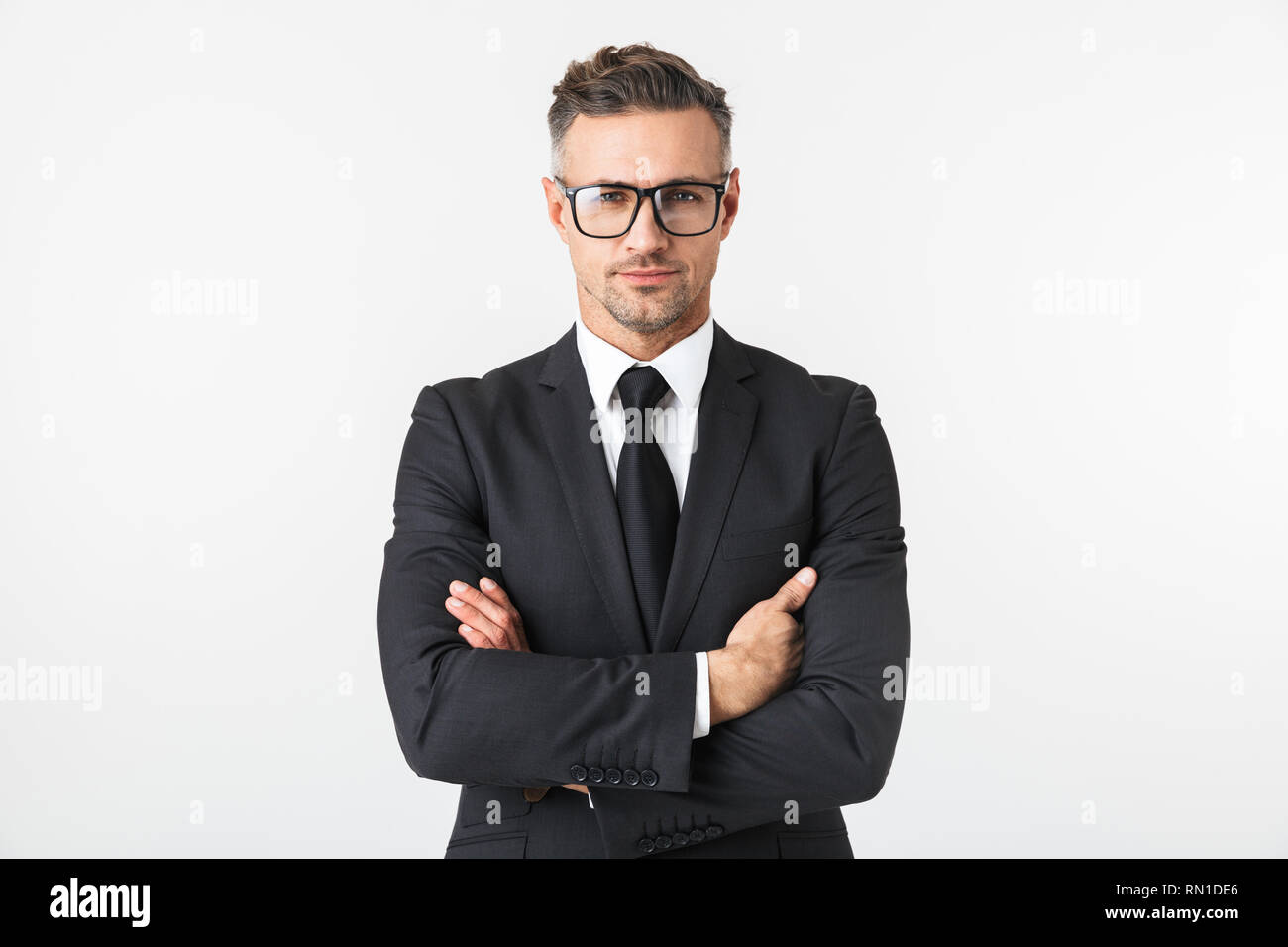 Image of a handsome business man isolated over white wall background ...