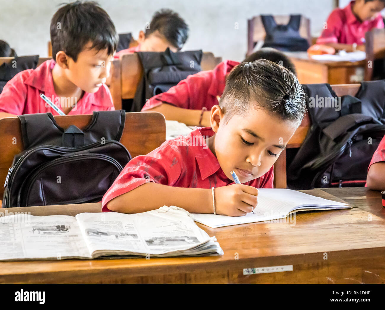 Pupils classroom uniform hi-res stock photography and images - Alamy